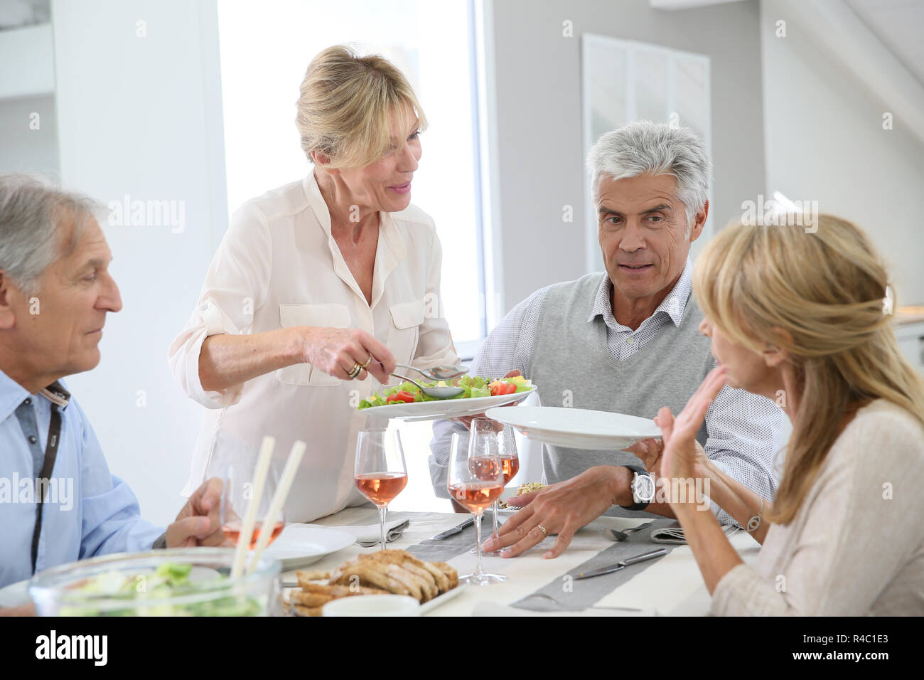 Older women having lunch together hi-res stock photography and images ...