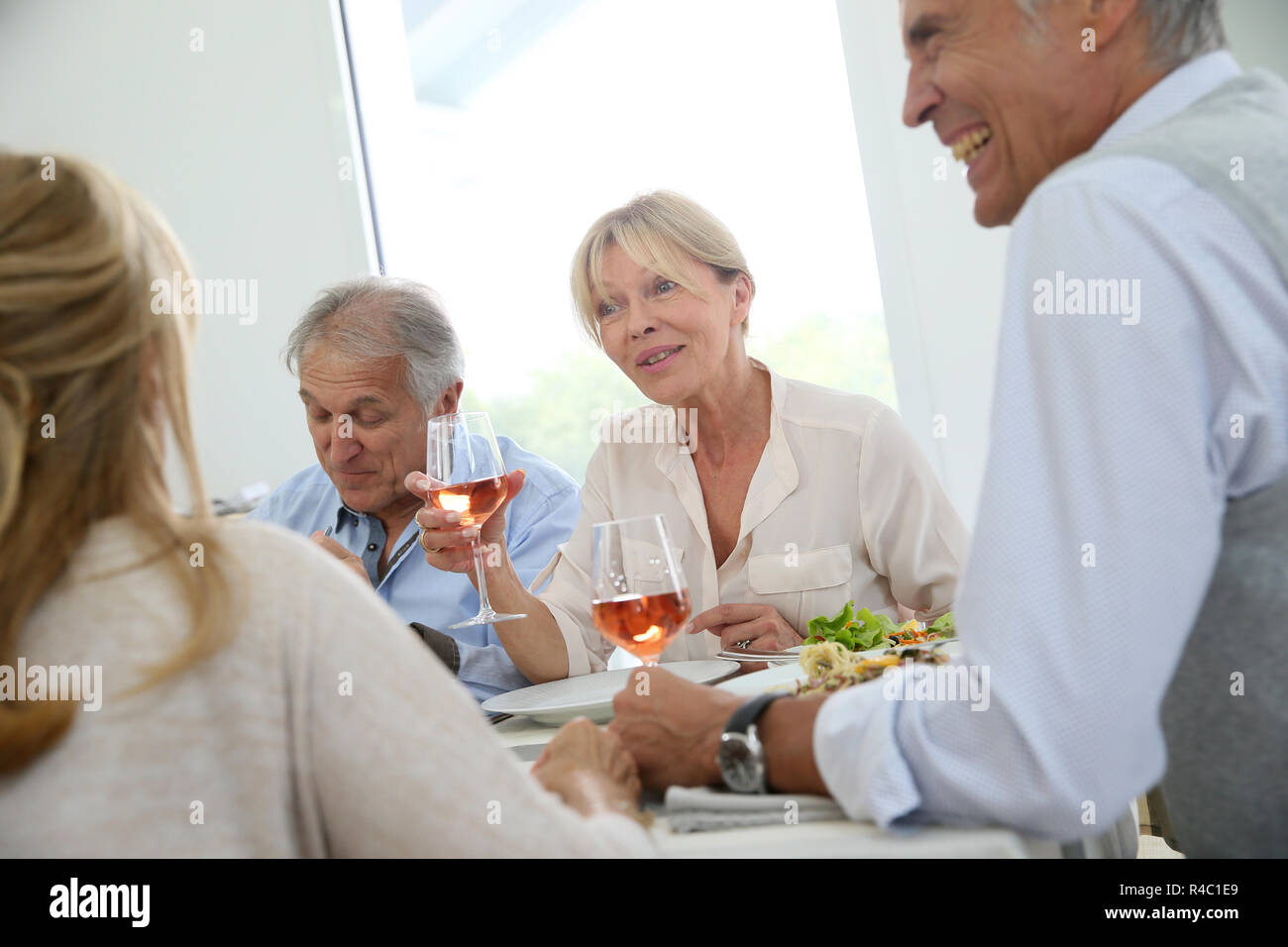 Older women having lunch together hi-res stock photography and images ...