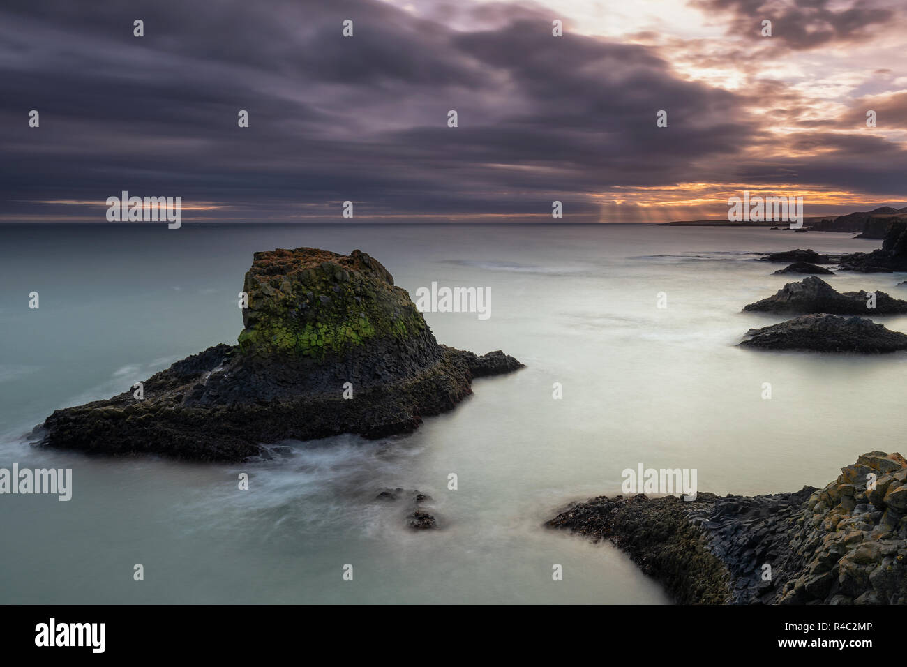 Volcanic cliffs and basalt rocks in Arnarstapi, Iceland Stock Photo - Alamy