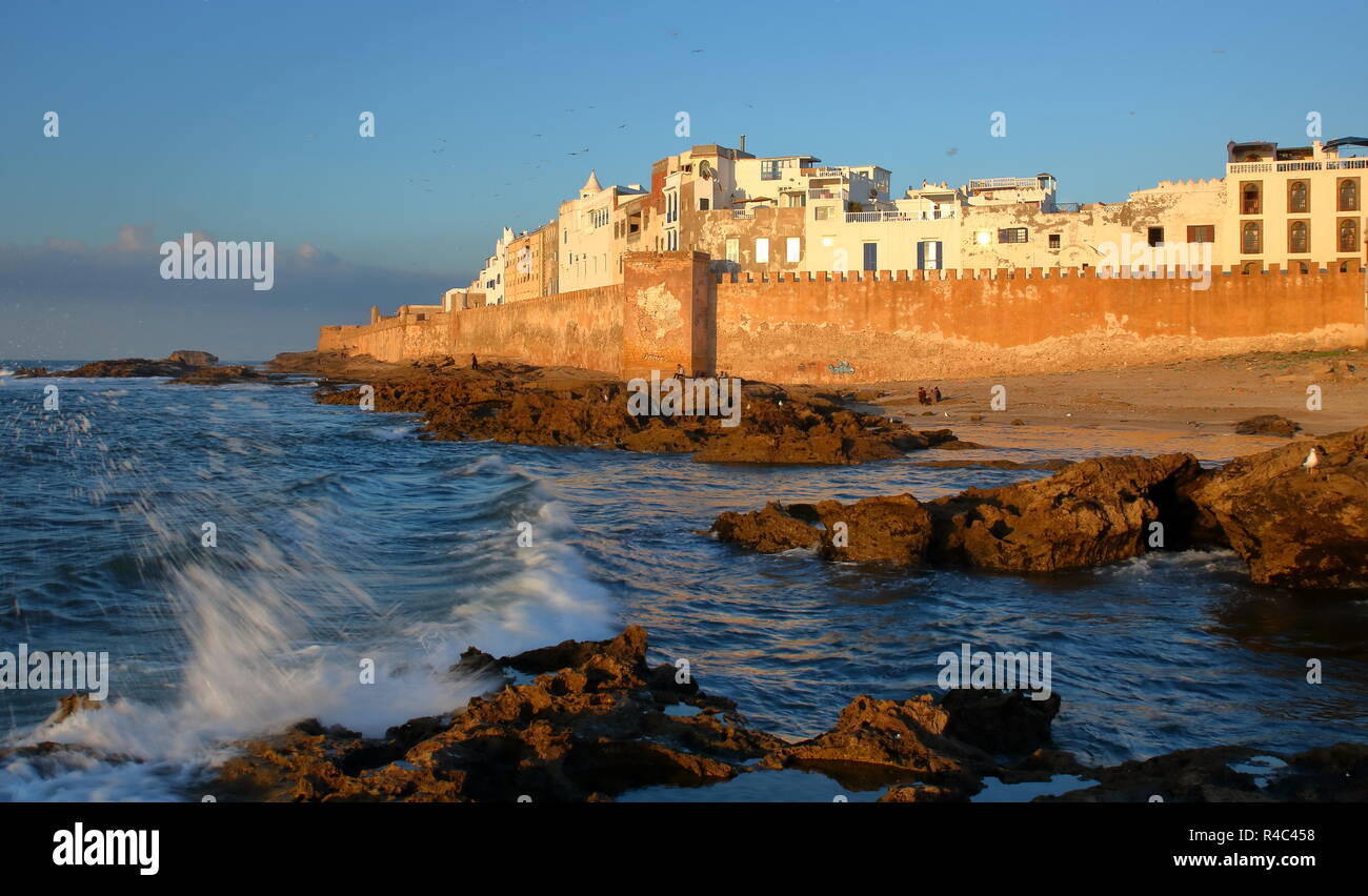 View at Essaouira fortification from ocean, coastline, rocks in water ...