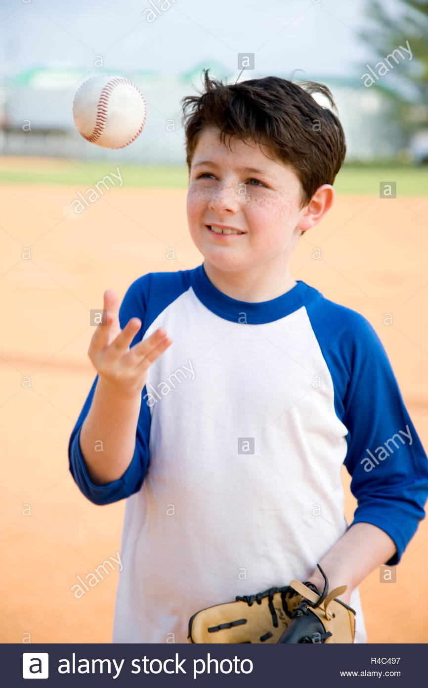 Boy Catching Ball Baseball Stock Photos & Boy Catching Ball Baseball ...