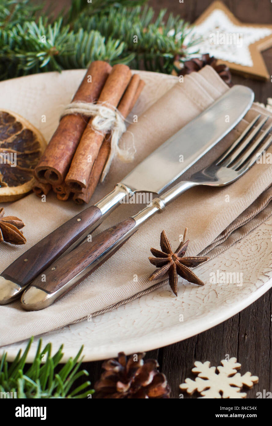 Holidays table setting with spices and dried fruits Stock Photo - Alamy