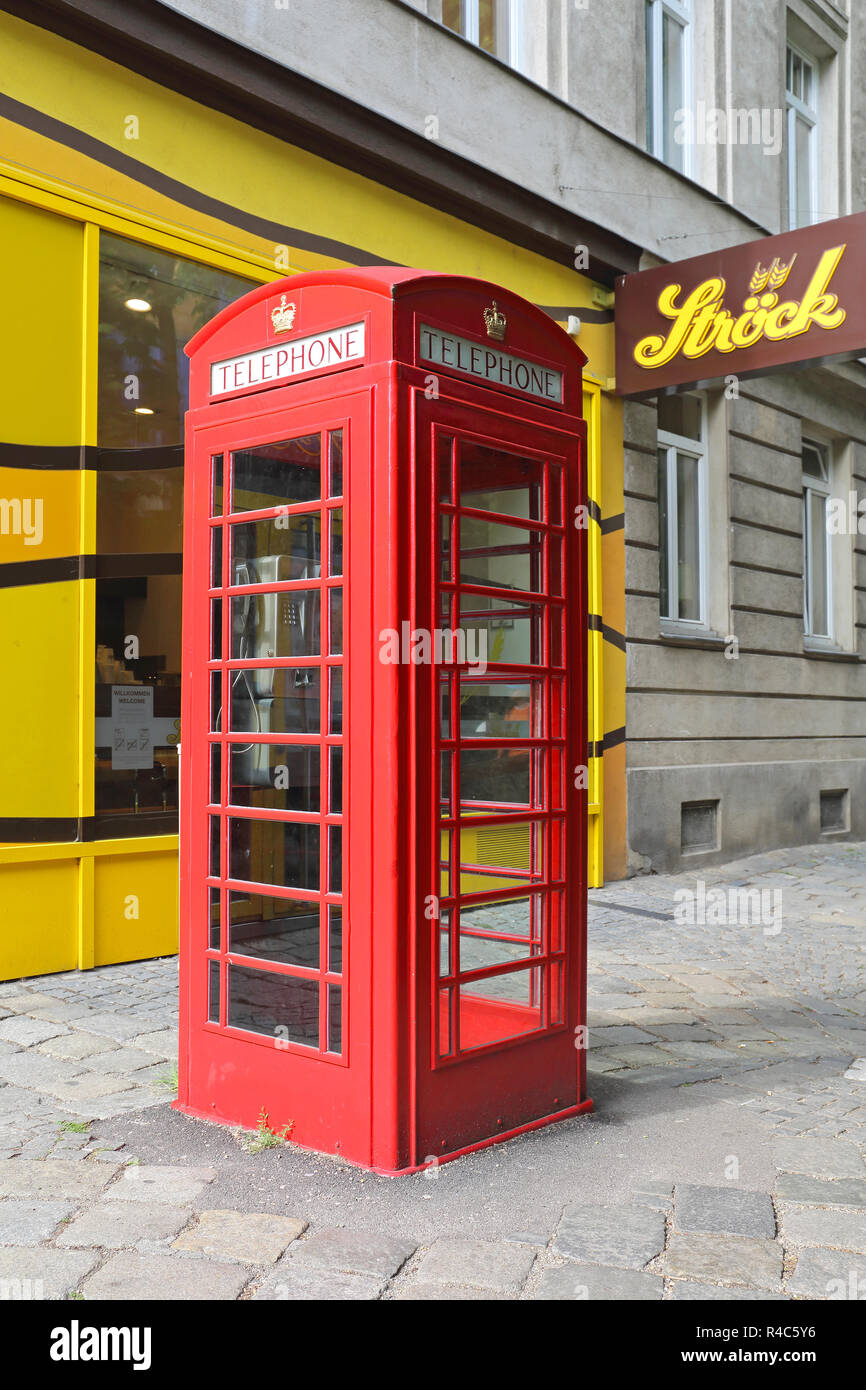 VIENNA, AUSTRIA - JULY 12: Red Telephone Box in Wien on JULY 12, 2015 ...