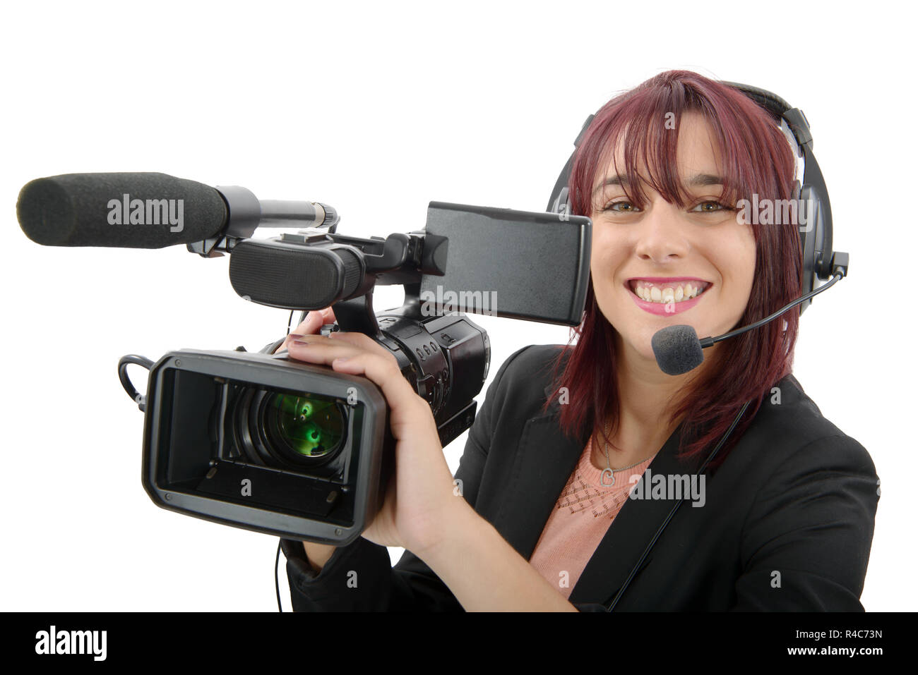young woman with a professional video camera Stock Photo - Alamy
