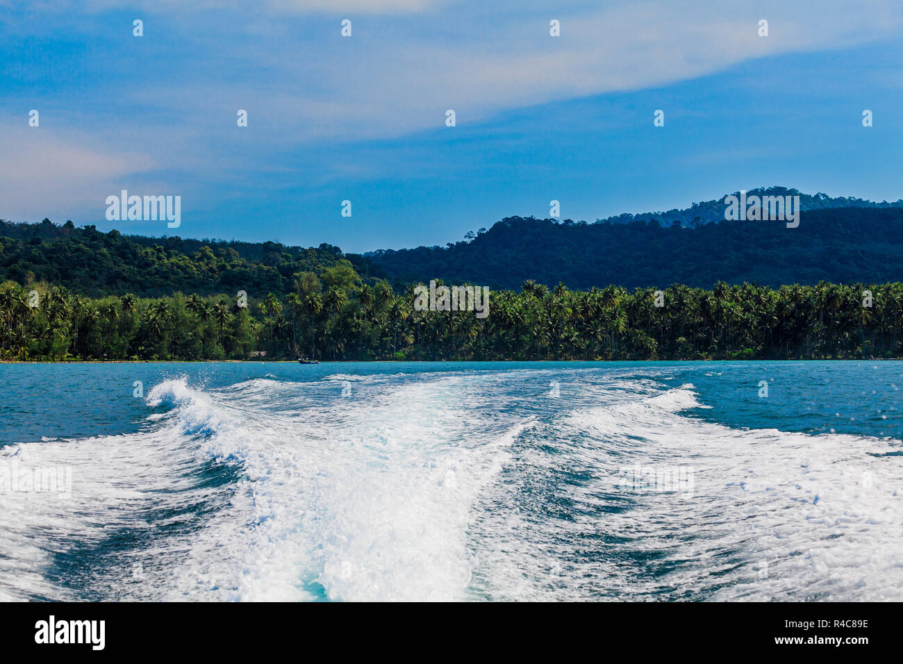 Water stream after speed boat. Trail on water surface behind of fast ...