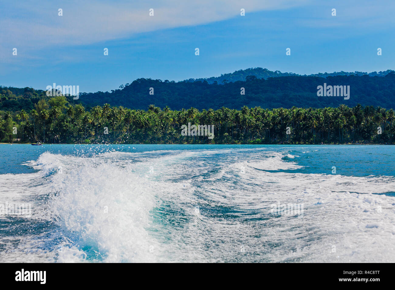 Water stream after speed boat. Trail on water surface behind of fast ...