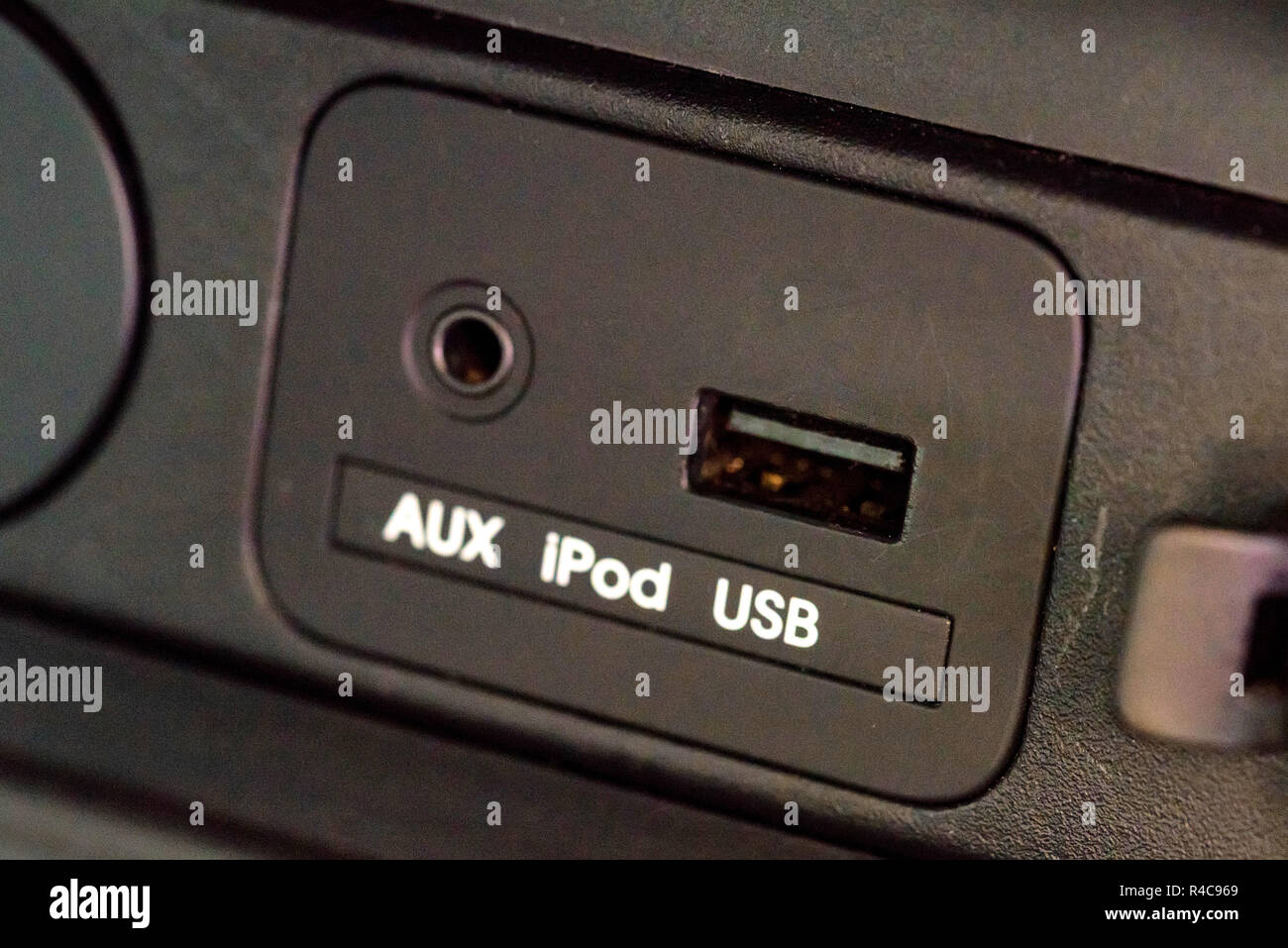Car interior aux and usb charging cable connection Stock Photo - Alamy