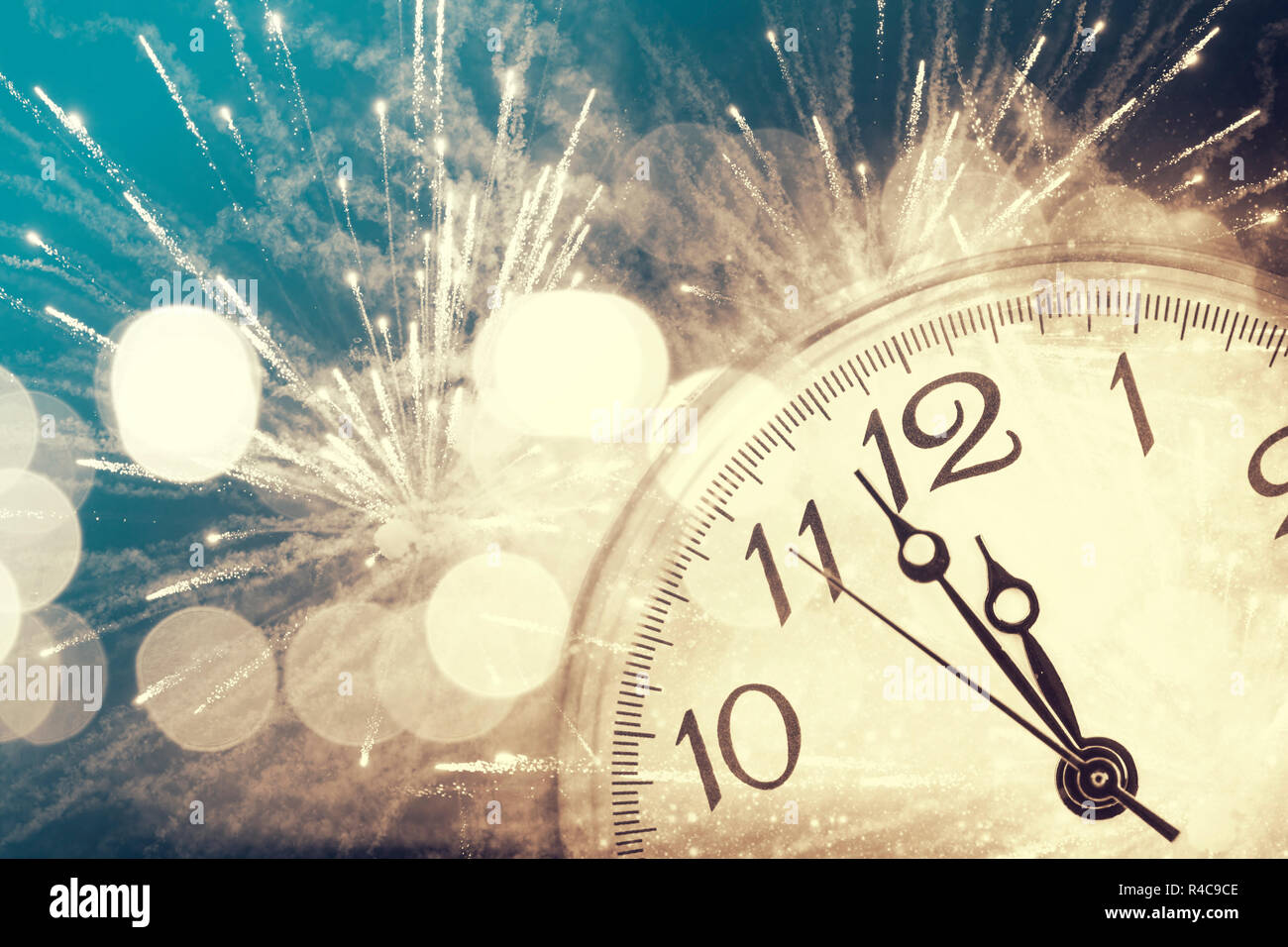 Abstract background with fireworks and clock close to midnight Stock ...