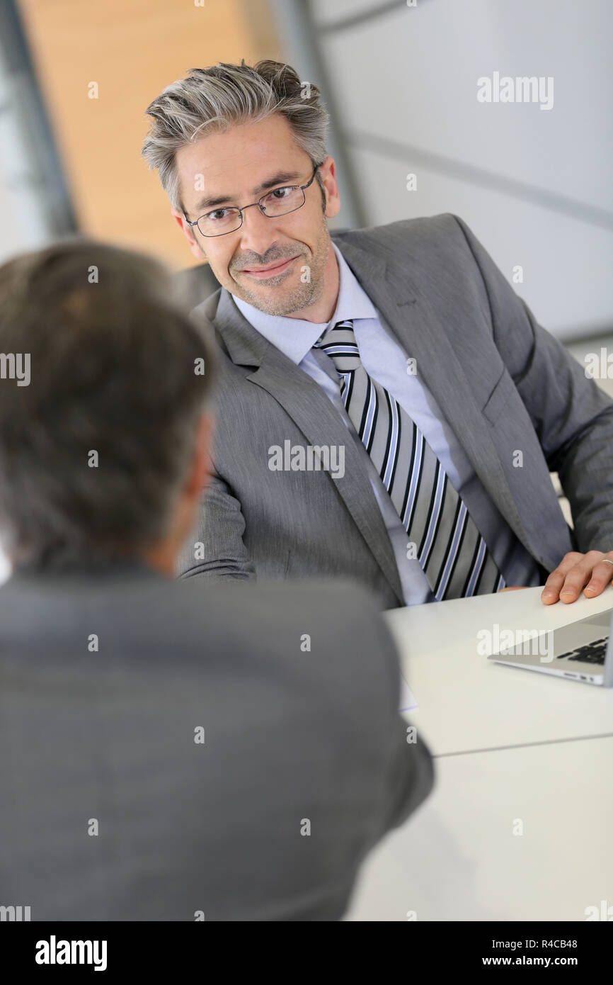 Older men shaking hands hi-res stock photography and images - Alamy