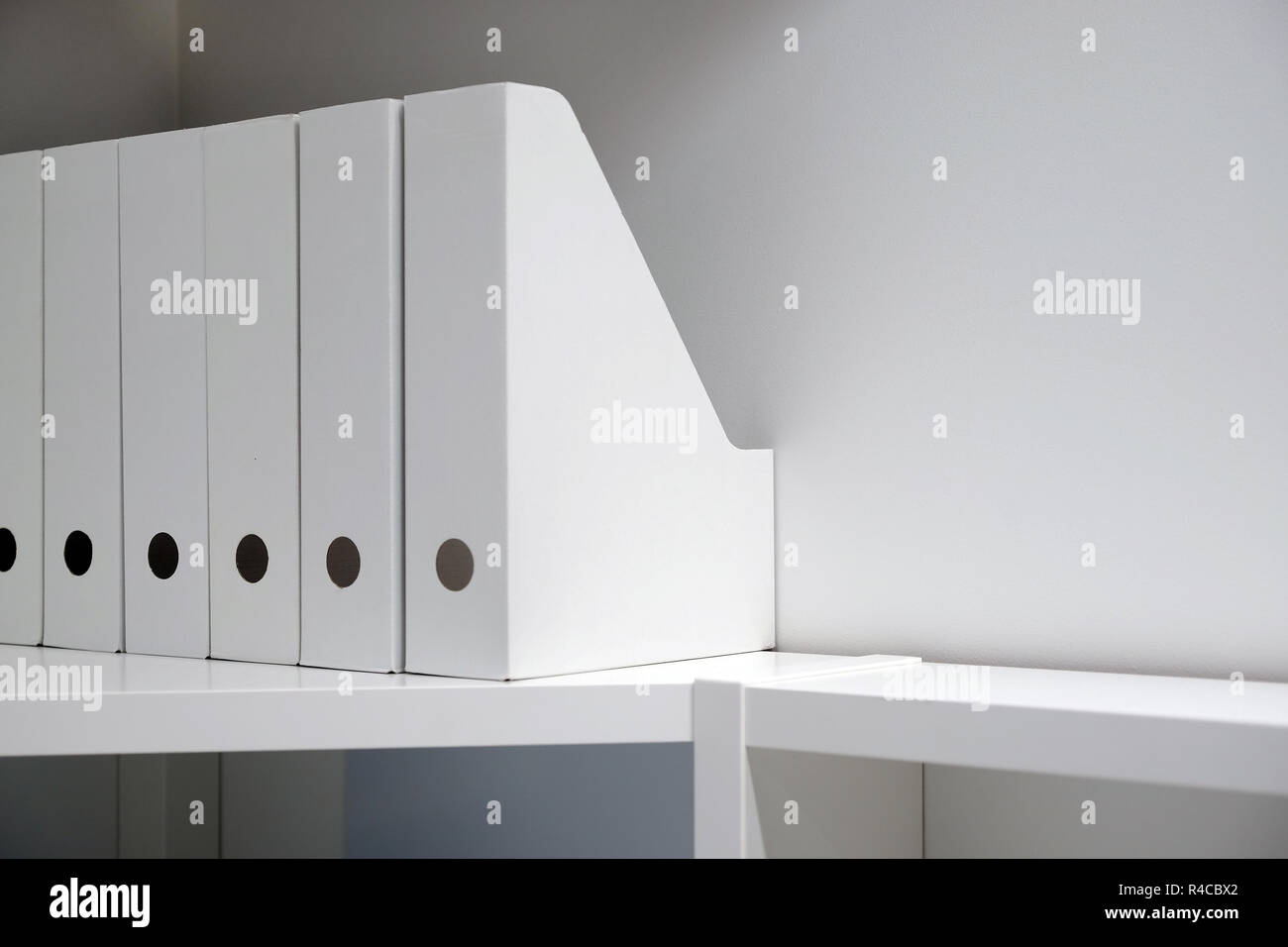 Office folders for documents. A folder with files on the sideboard in a ...