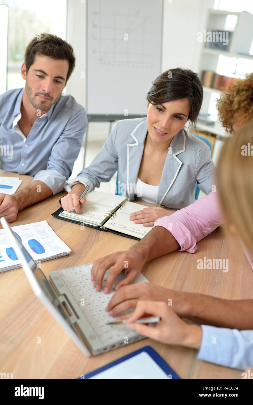 Business people meeting around table Stock Photo - Alamy
