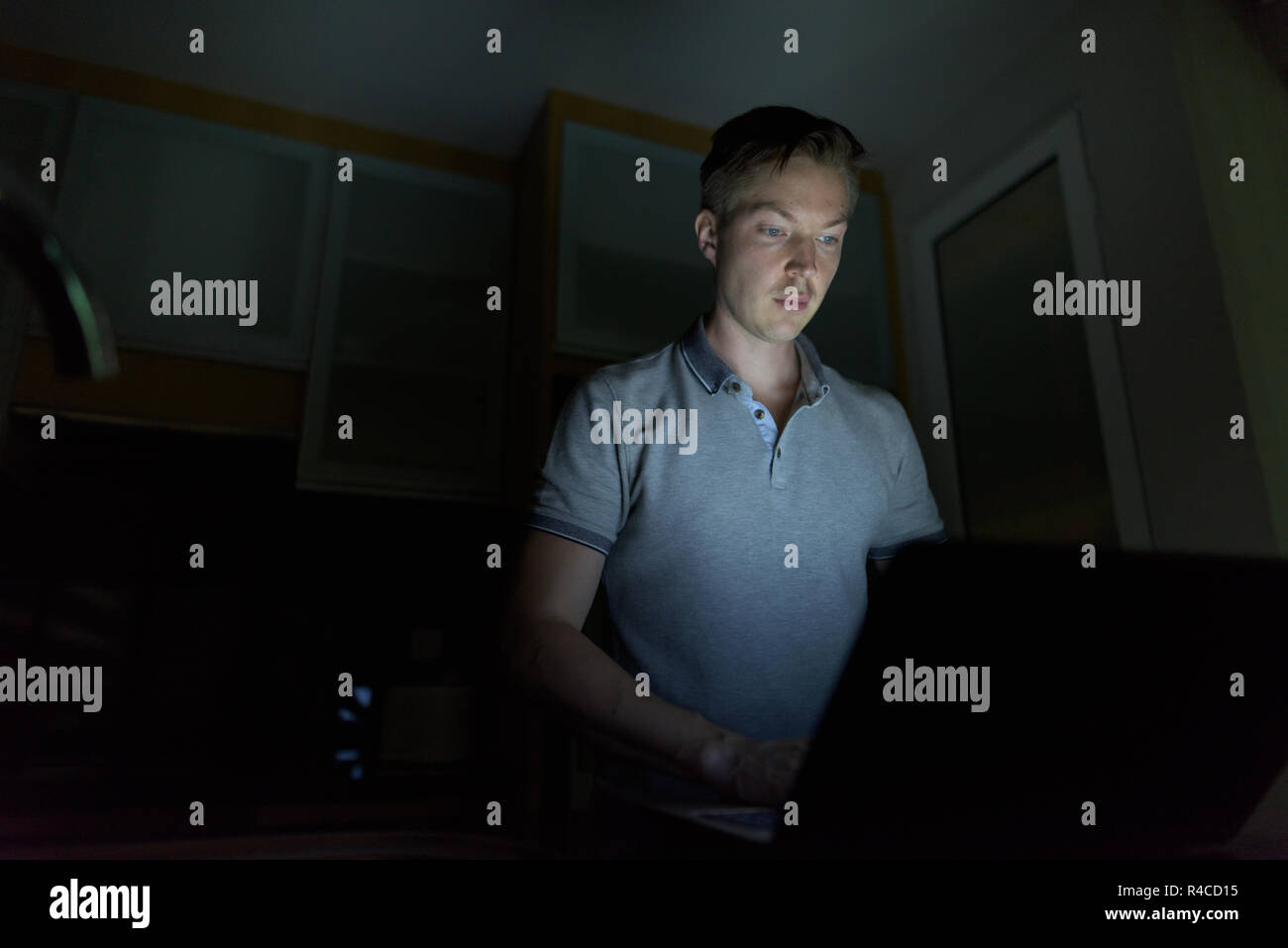 Dark room laptop hi-res stock photography and images - Alamy
