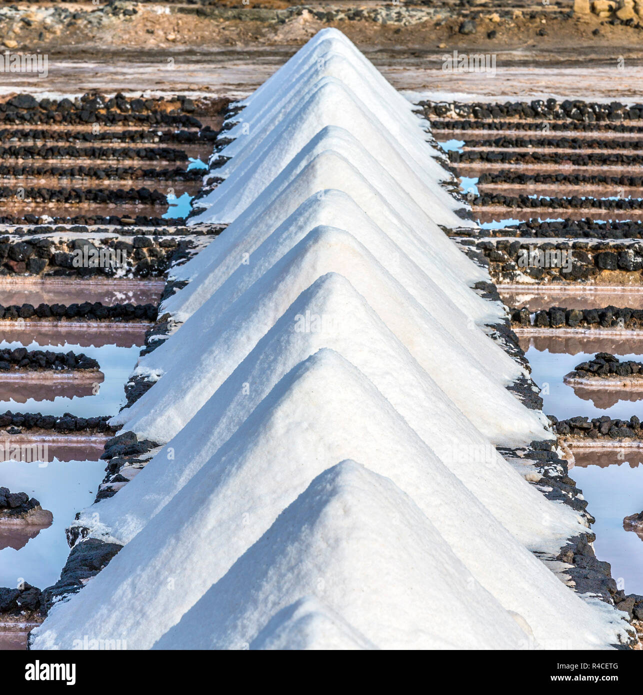 salt piles in the saline of janubio Stock Photo - Alamy