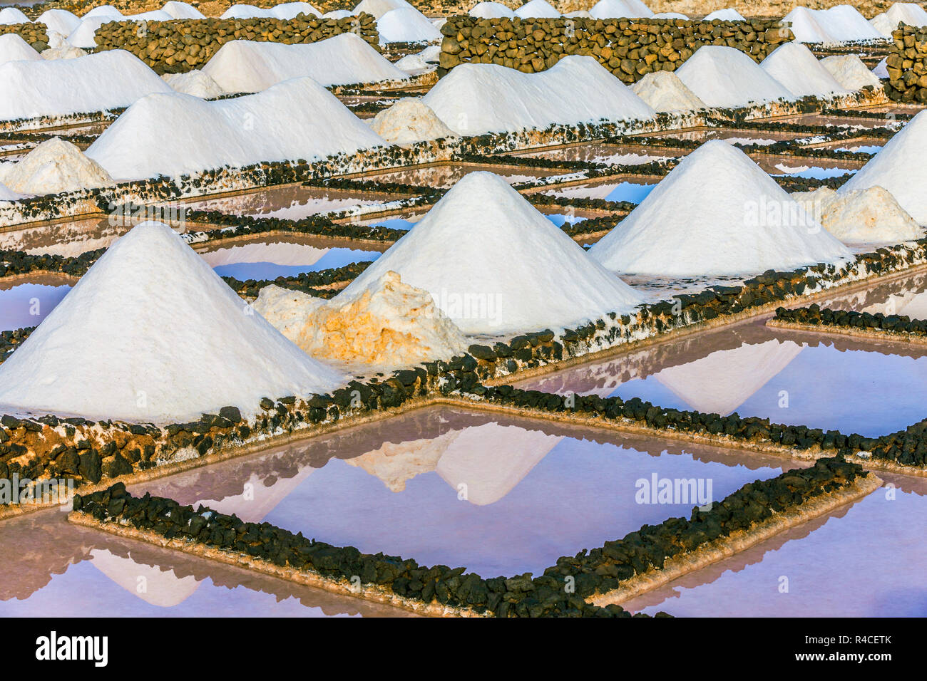 salt piles in the saline of janubio Stock Photo - Alamy