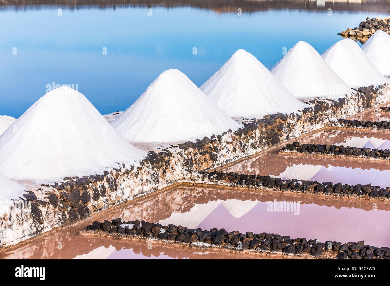 salt piles in the saline of janubio Stock Photo - Alamy