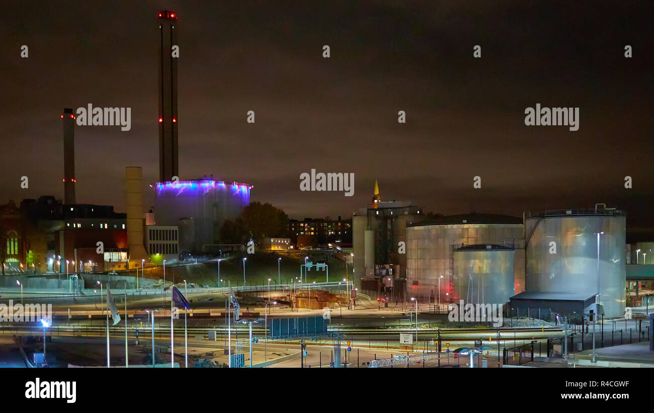 Modern grain terminal at night. Metal tanks of elevator. Grain-drying ...