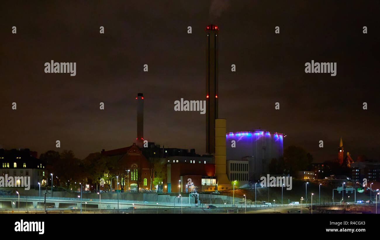 Modern grain terminal at night. Metal tanks of elevator. Grain-drying ...