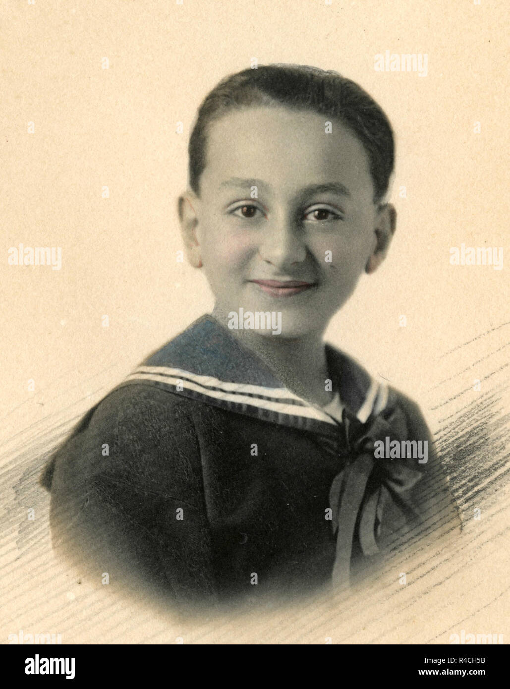 Hand colored old portrait of a boy, 1910s Stock Photo - Alamy