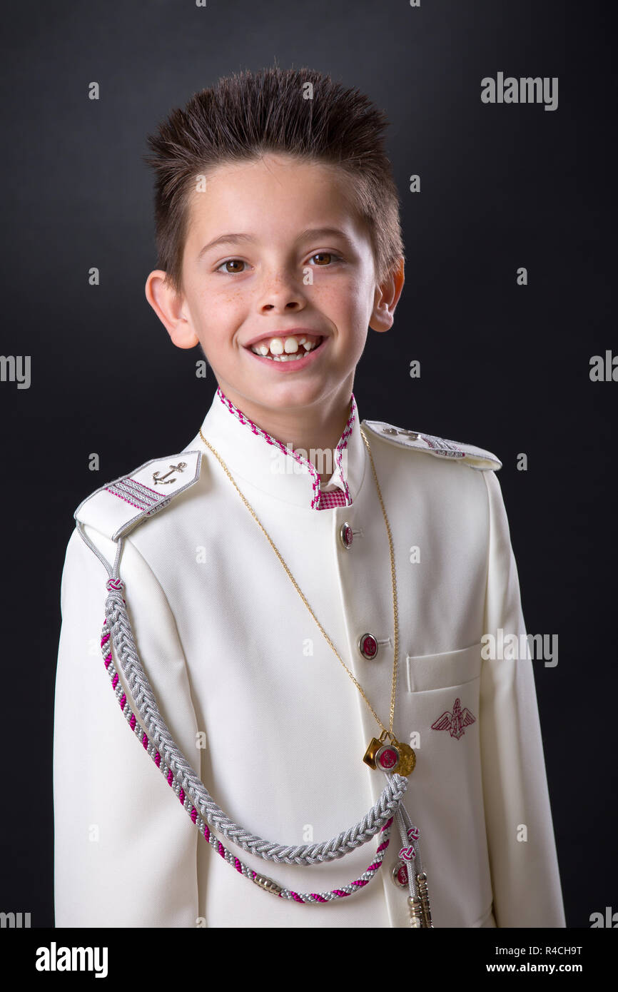 Young boy smiling in his First Holy Communion Stock Photo - Alamy