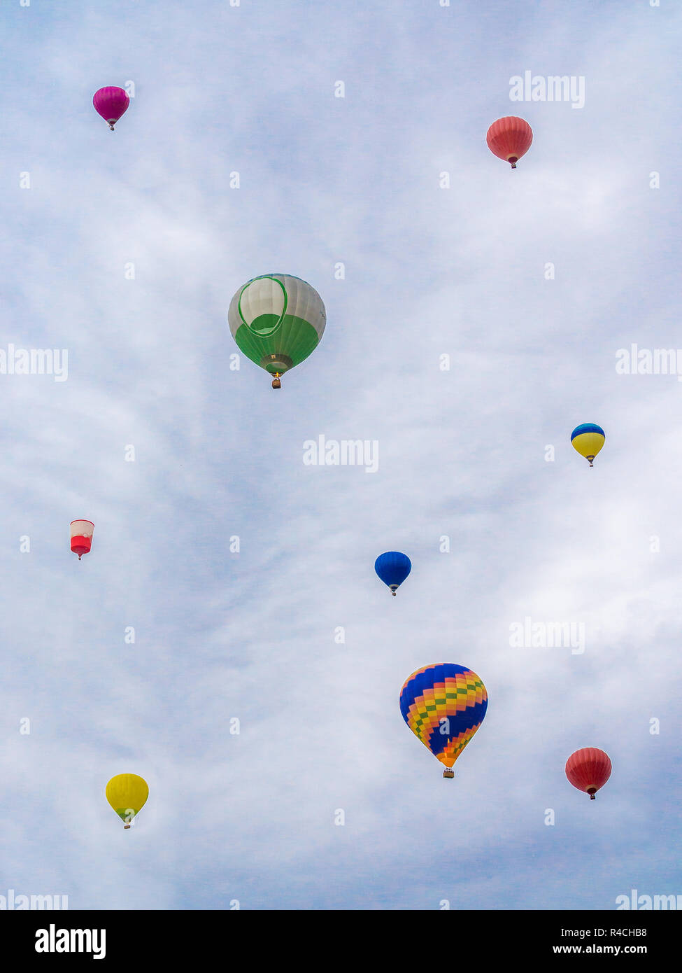 Nine balloons bottom view on the evening sky background Stock Photo - Alamy