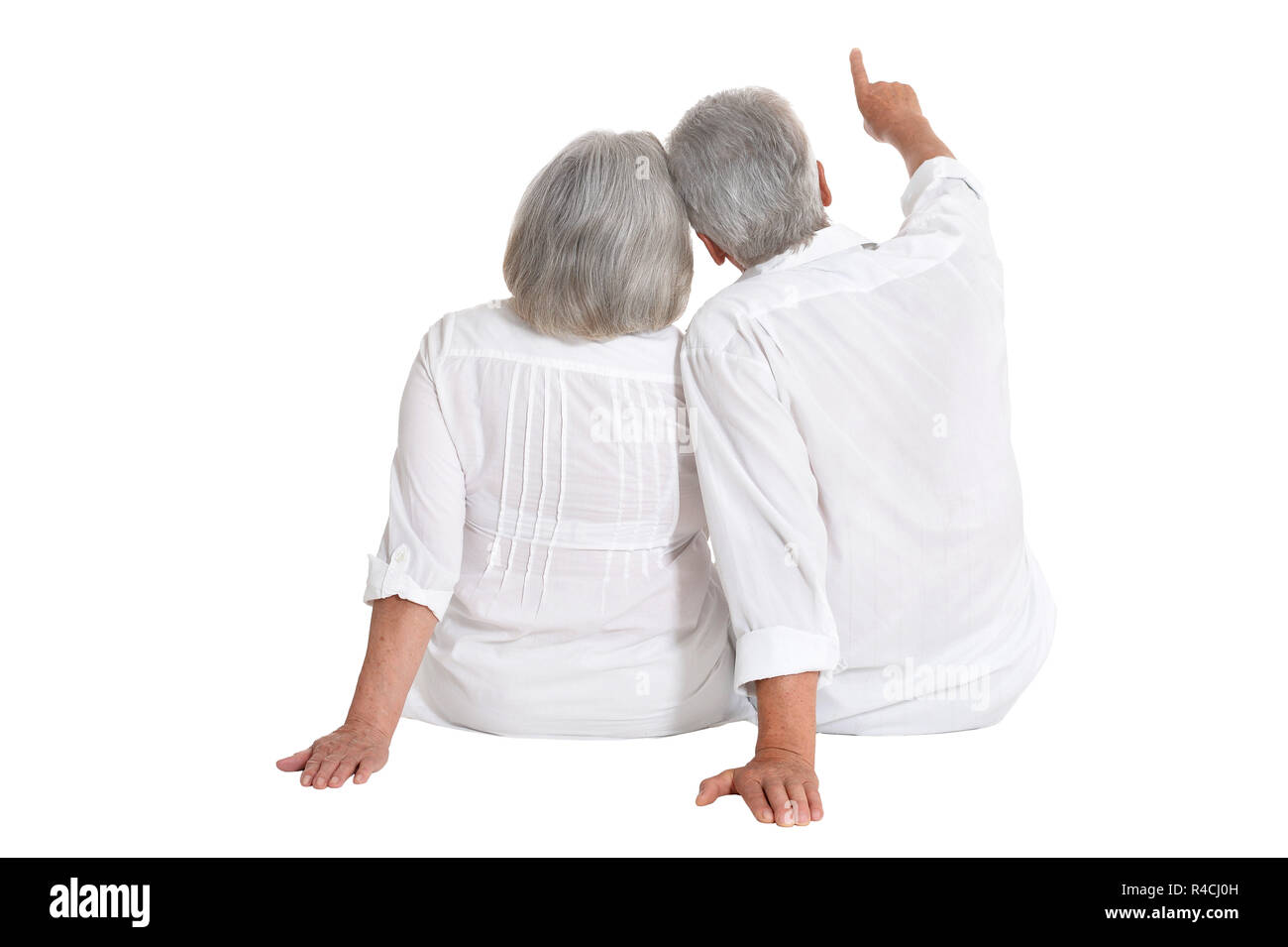 Rear view of senior couple hugging isolated on white background Stock ...