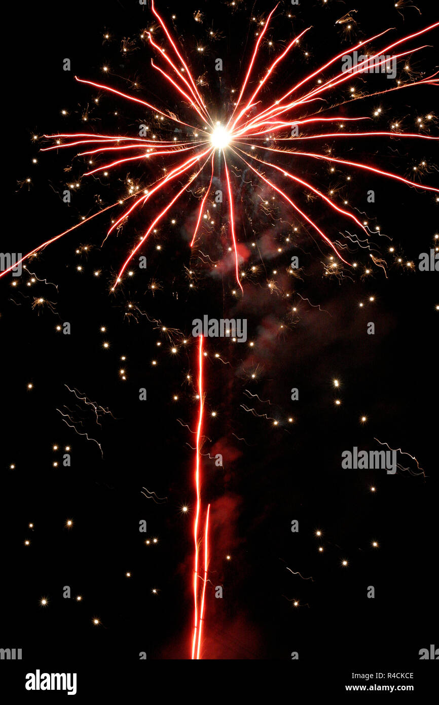Exploding firework with a Black background Stock Photo - Alamy