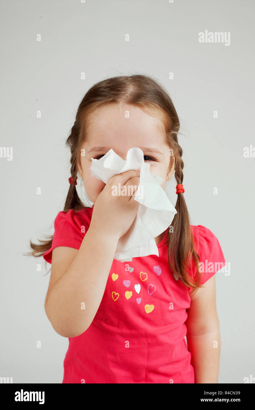 Cleaning nose with tissue paper hi-res stock photography and images - Alamy