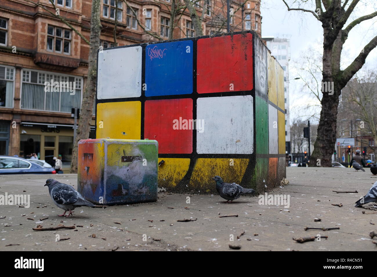rubik's cube public art and pigeons in London, UK Stock Photo - Alamy