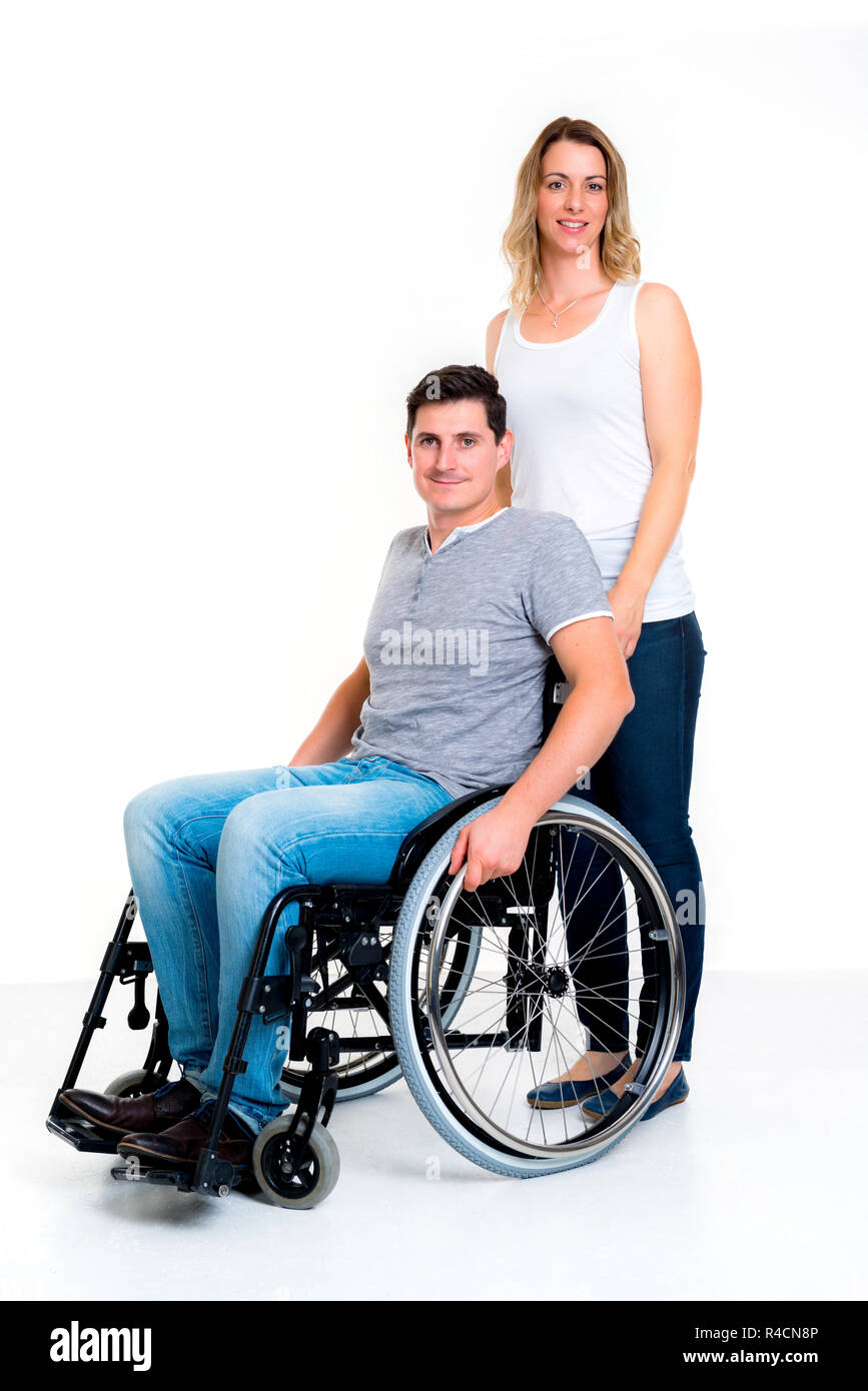 Young couple hugging chair Cut Out Stock Images & Pictures - Alamy