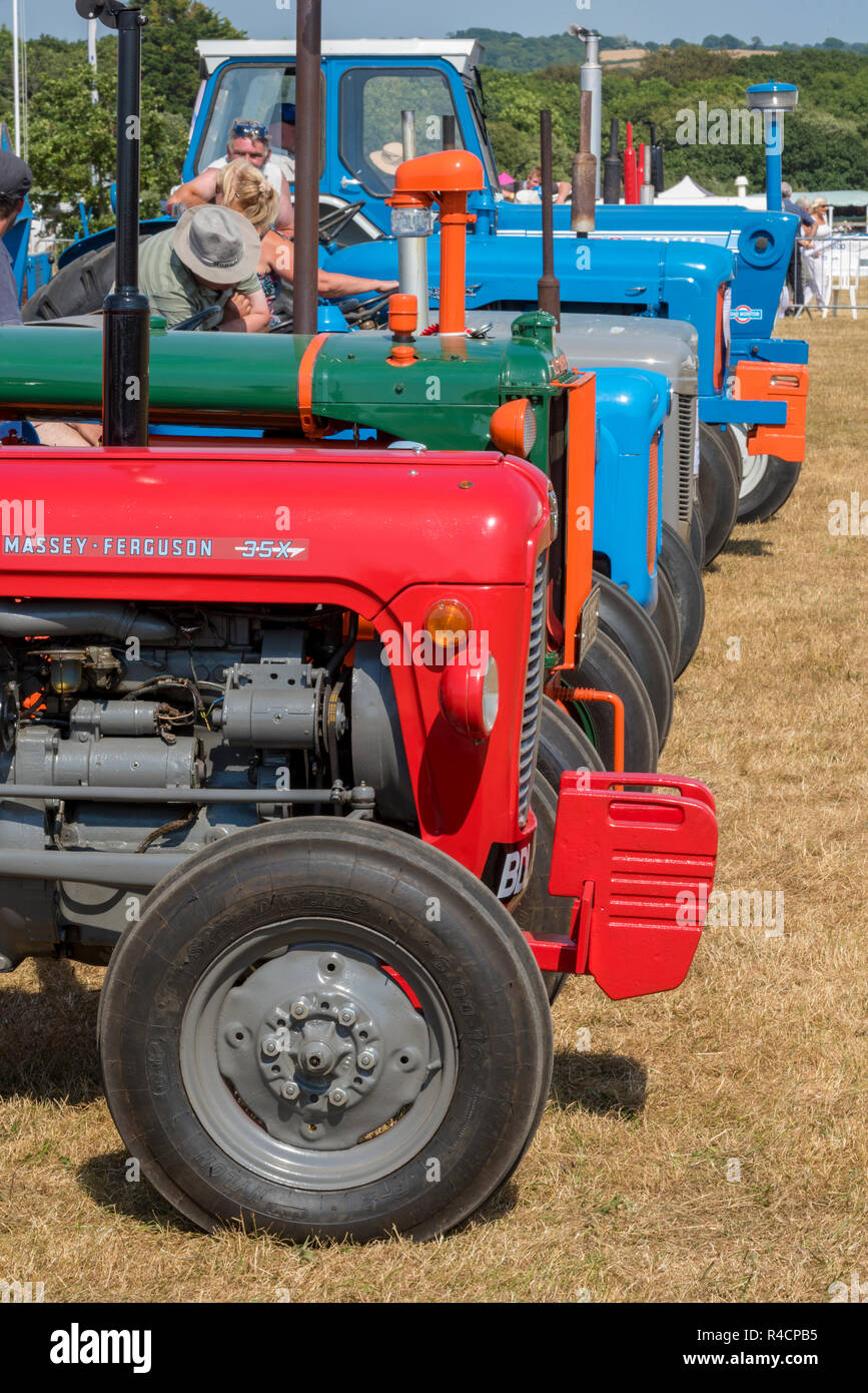 vintage tractors and farm equipment at a country agricultural show ...