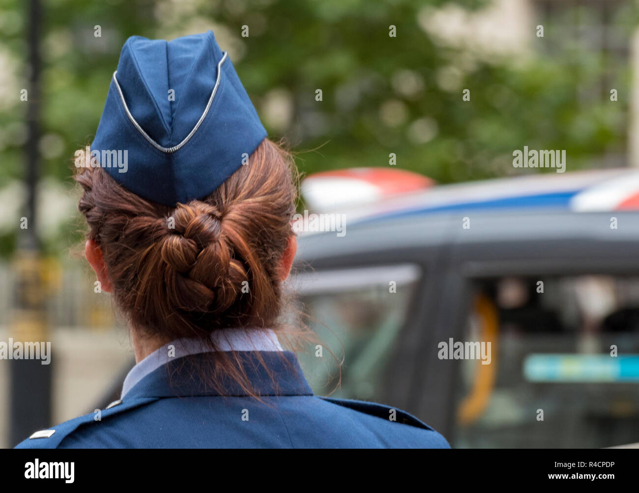 a female united states air force officer in full uniform in the centre ...
