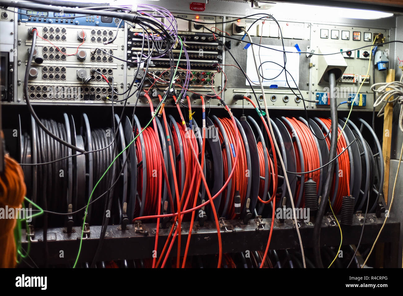 Cables and control panel detail from a television broadcasting truck ...