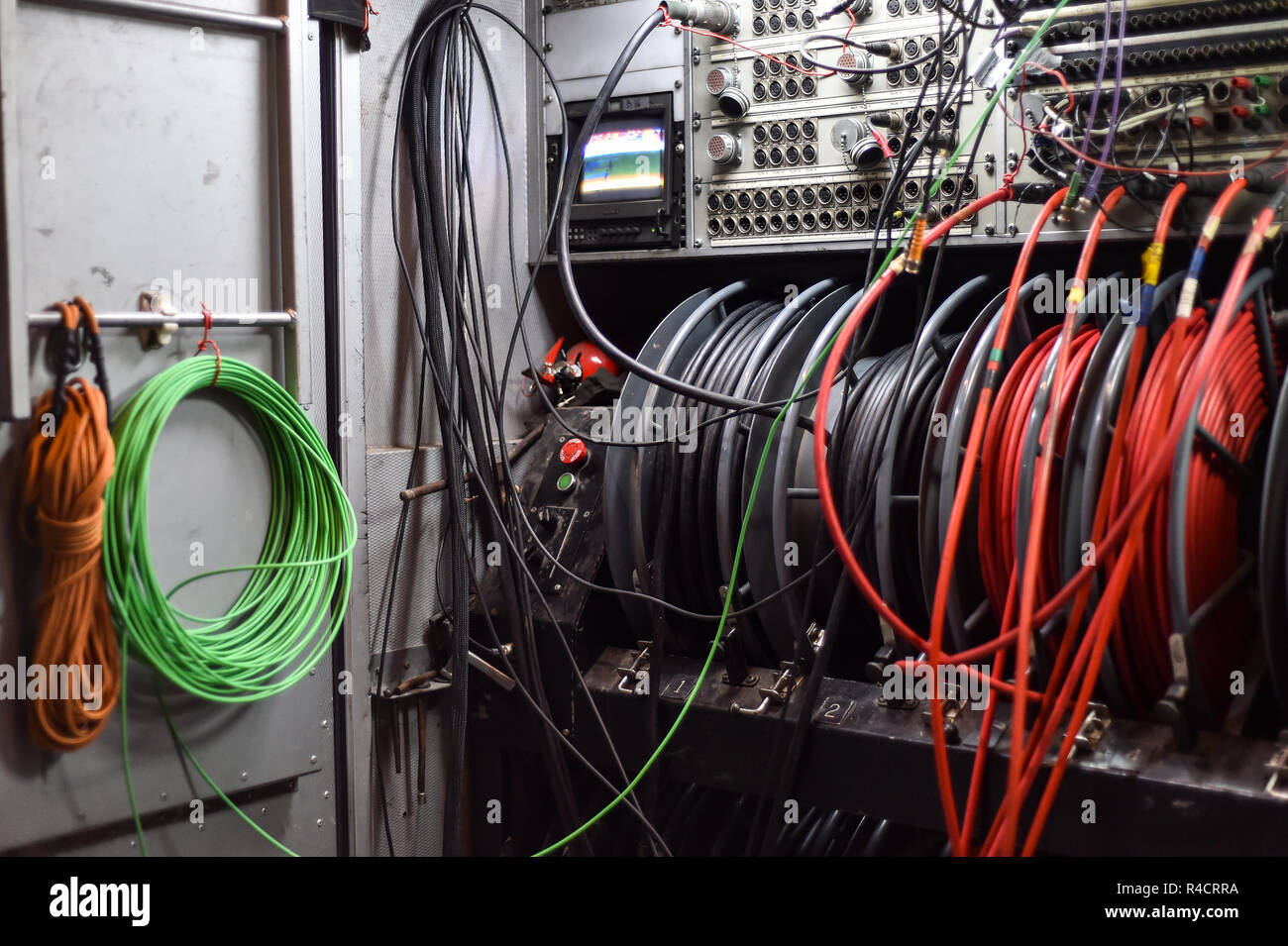 Cables and control panel detail from a television broadcasting truck ...
