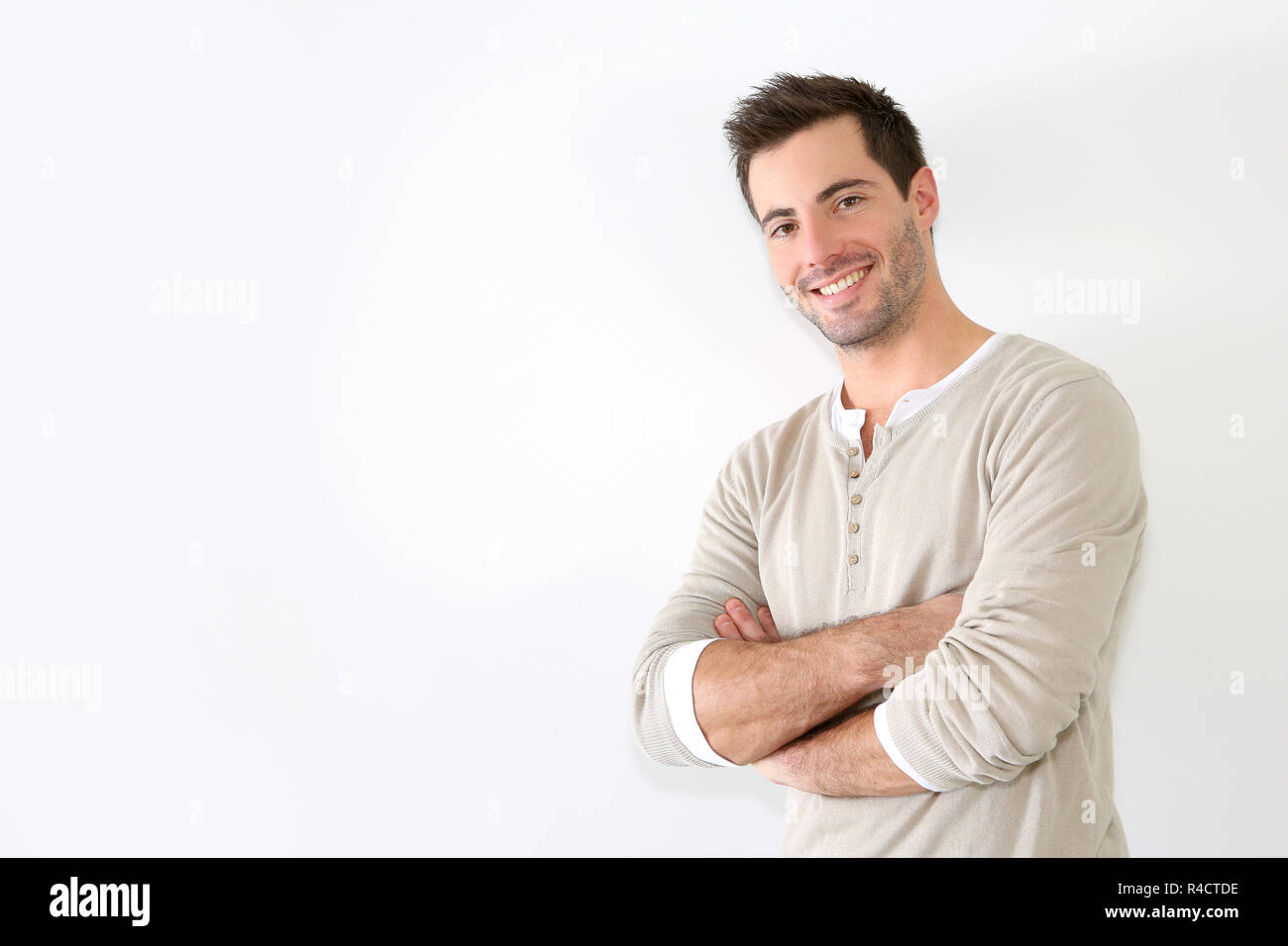 Handsome guy standing on white background Stock Photo - Alamy