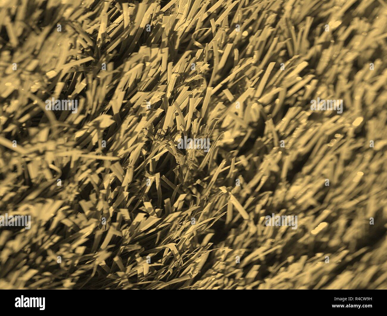 Artificial grass sepia Stock Photo - Alamy