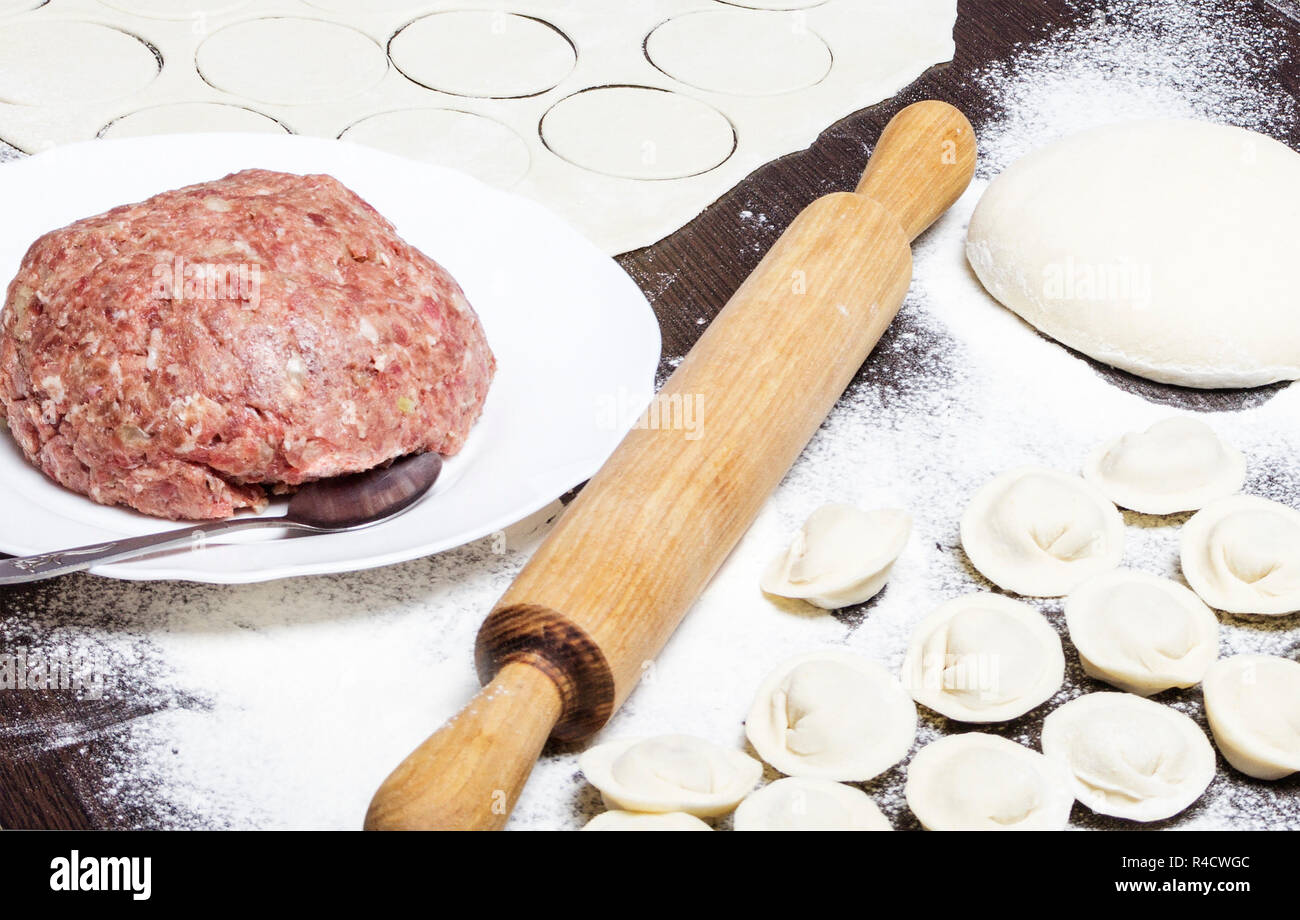 molding dumplings on the table Stock Photo - Alamy
