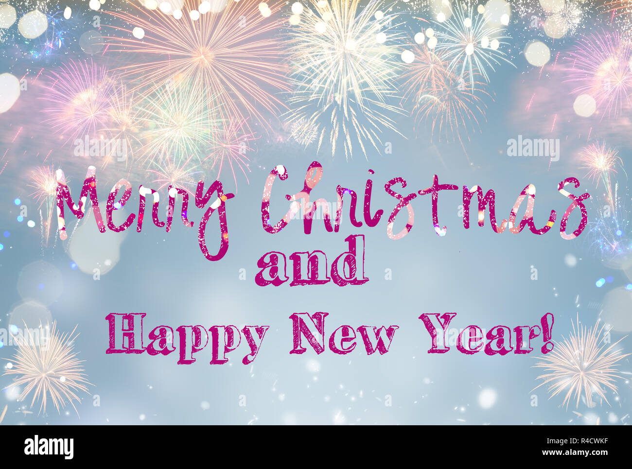 Fireworks colorful explosions on blue, festive background with Merry ...