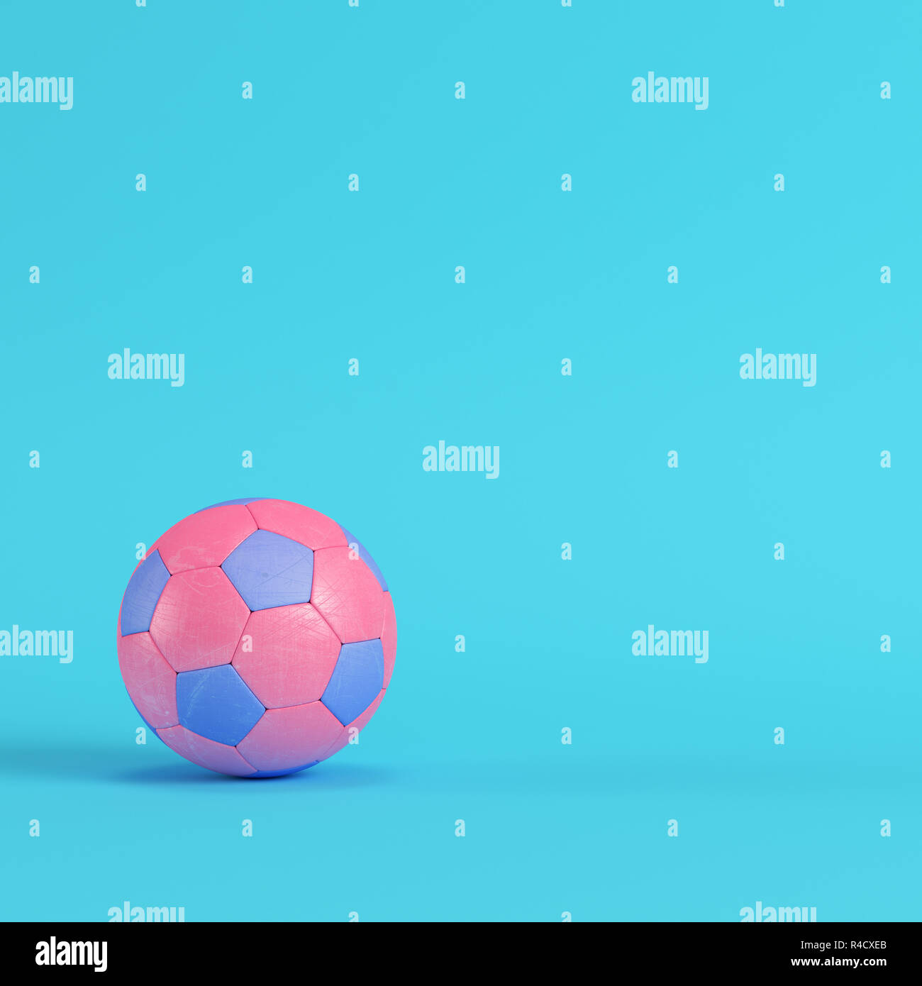 Pink soccer ball on bright blue background in pastel colors. Minimalism ...