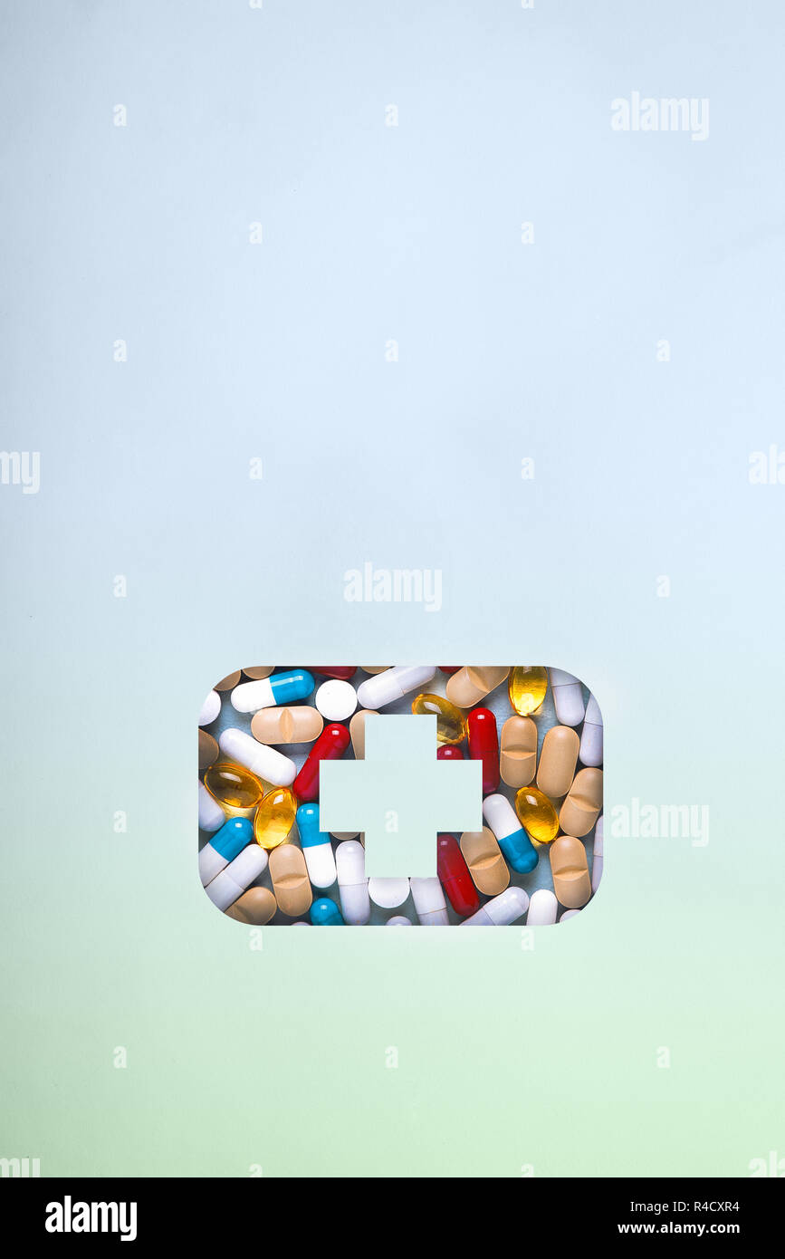 First Aid Kit with pills Minimalism. The concept of first aid in case ...