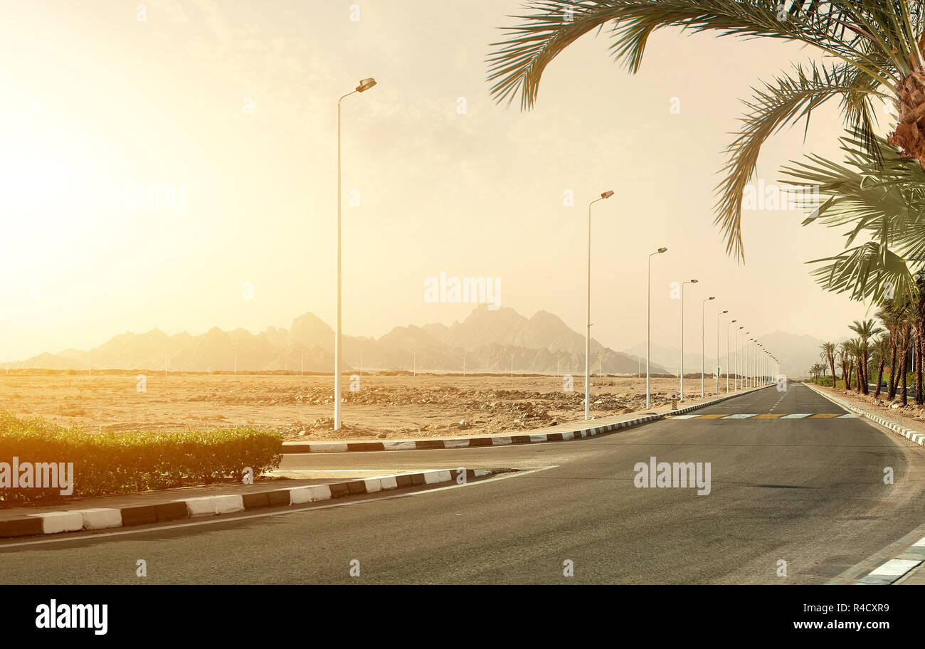 Highway in desert Stock Photo - Alamy