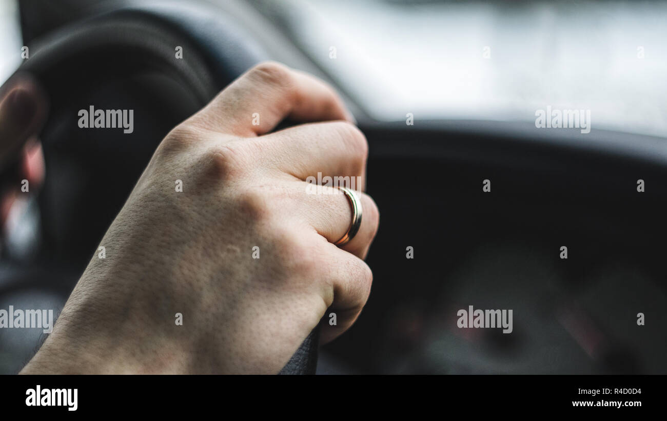 Drivers hand holding steering wheel hi-res stock photography and images ...