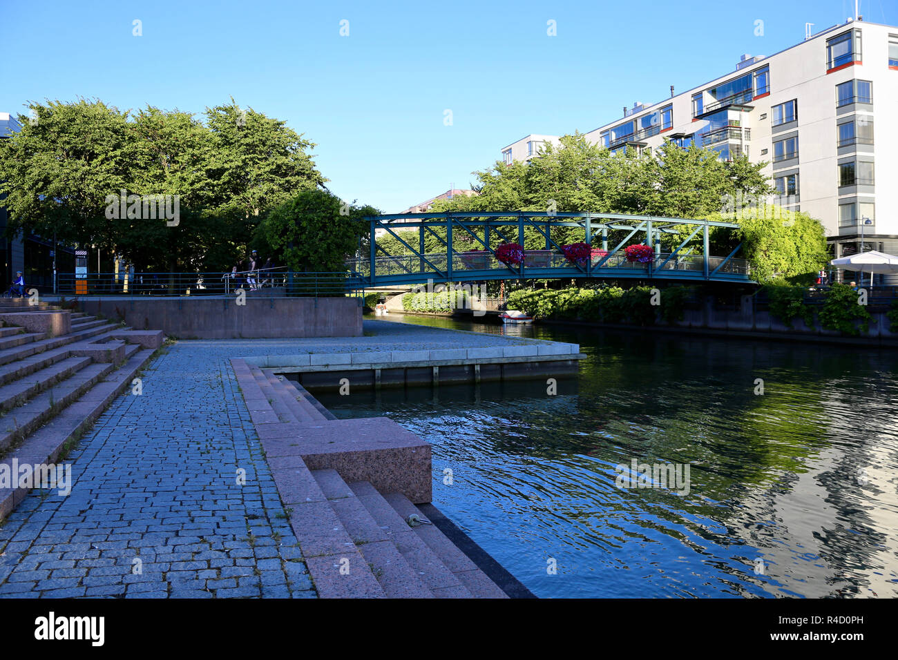 Beautiful residential area on western Helsinki: canal going through ...