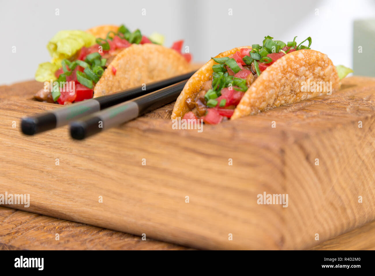 fresh mexican taco shells with beef and vegetables Stock Photo - Alamy