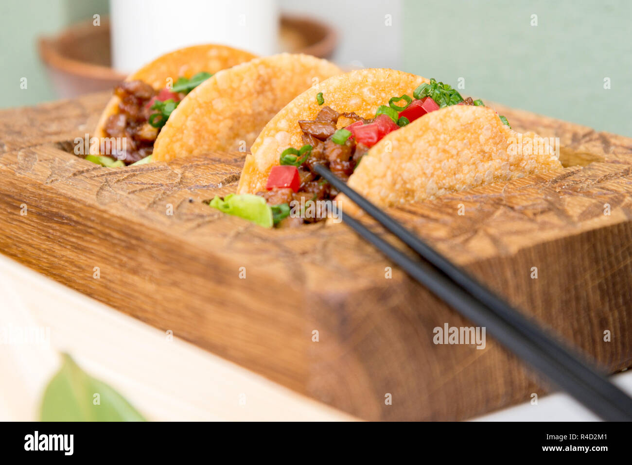 fresh mexican taco shells with beef and vegetables Stock Photo - Alamy
