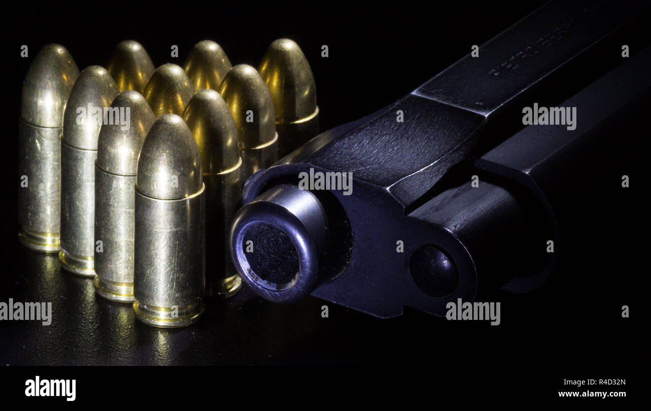 Gun and bullets Stock Photo - Alamy