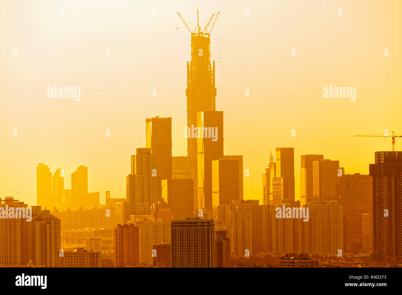 chinese city at sunset Stock Photo - Alamy