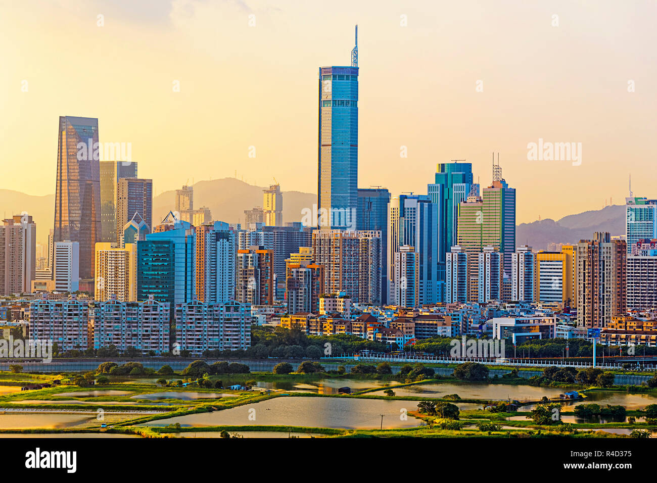 chinese city at sunset Stock Photo - Alamy