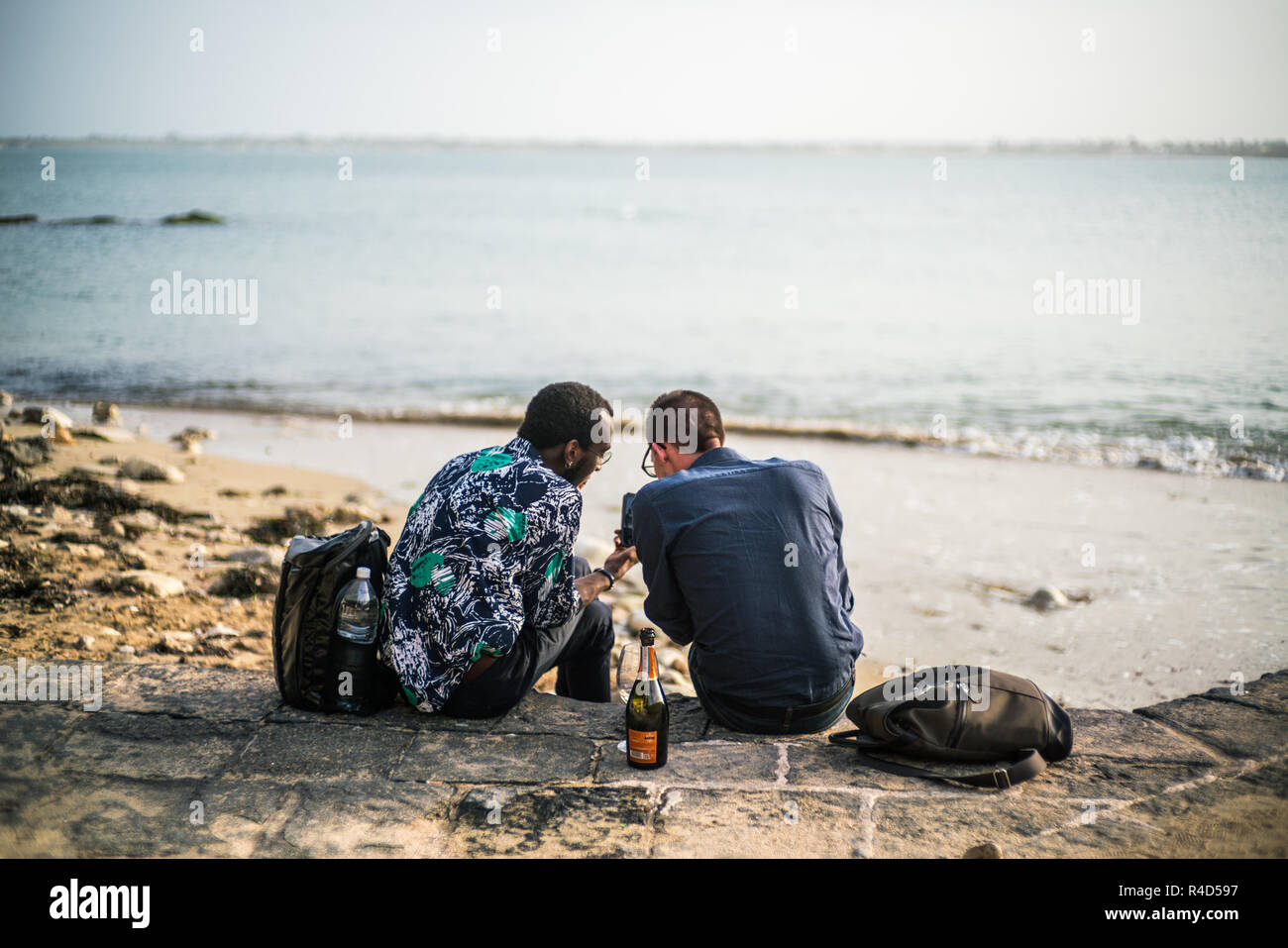 Two man on the beach in the Syracuse, Sicily, Italy, Europe Stock Photo ...