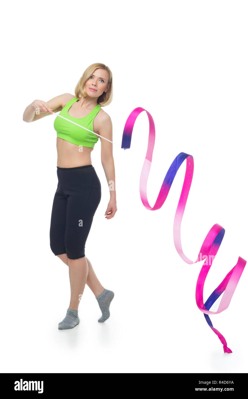 Beautiful woman doing sport exercise with gymnastic ribbon Stock Photo ...