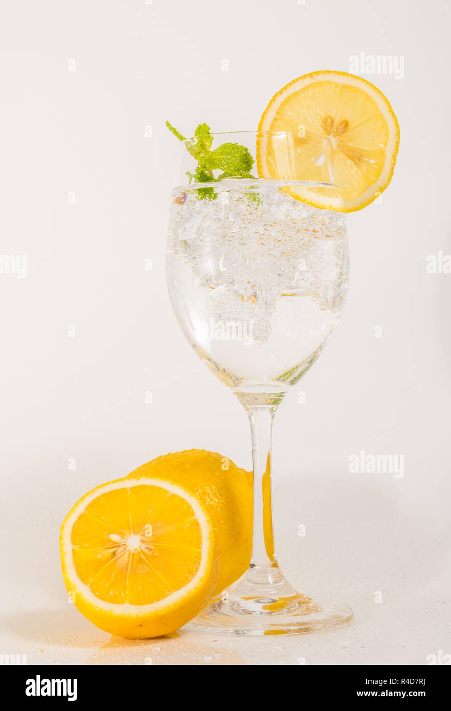 Glass of ice lemon soda drink Stock Photo - Alamy